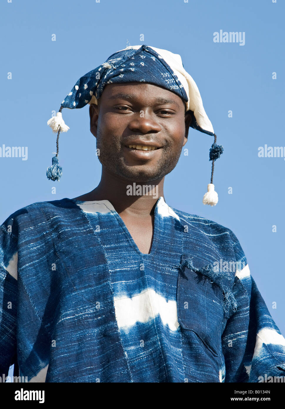 Mali, Dogon Country, Sangha. A young man dressed in traditional Dogon ...