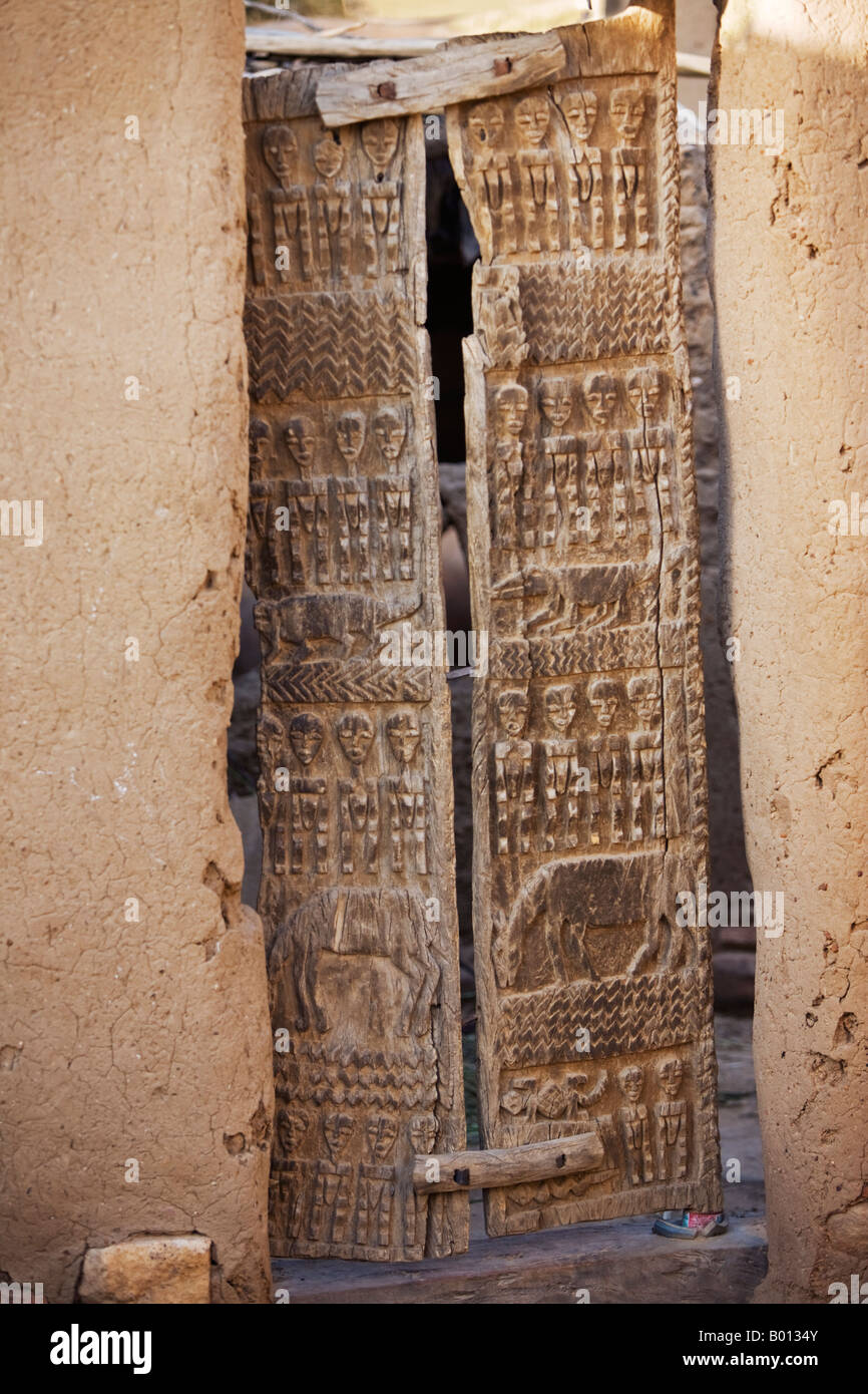 Mali, Dogon Country. A finely carved old Dogon door of a traditional ...