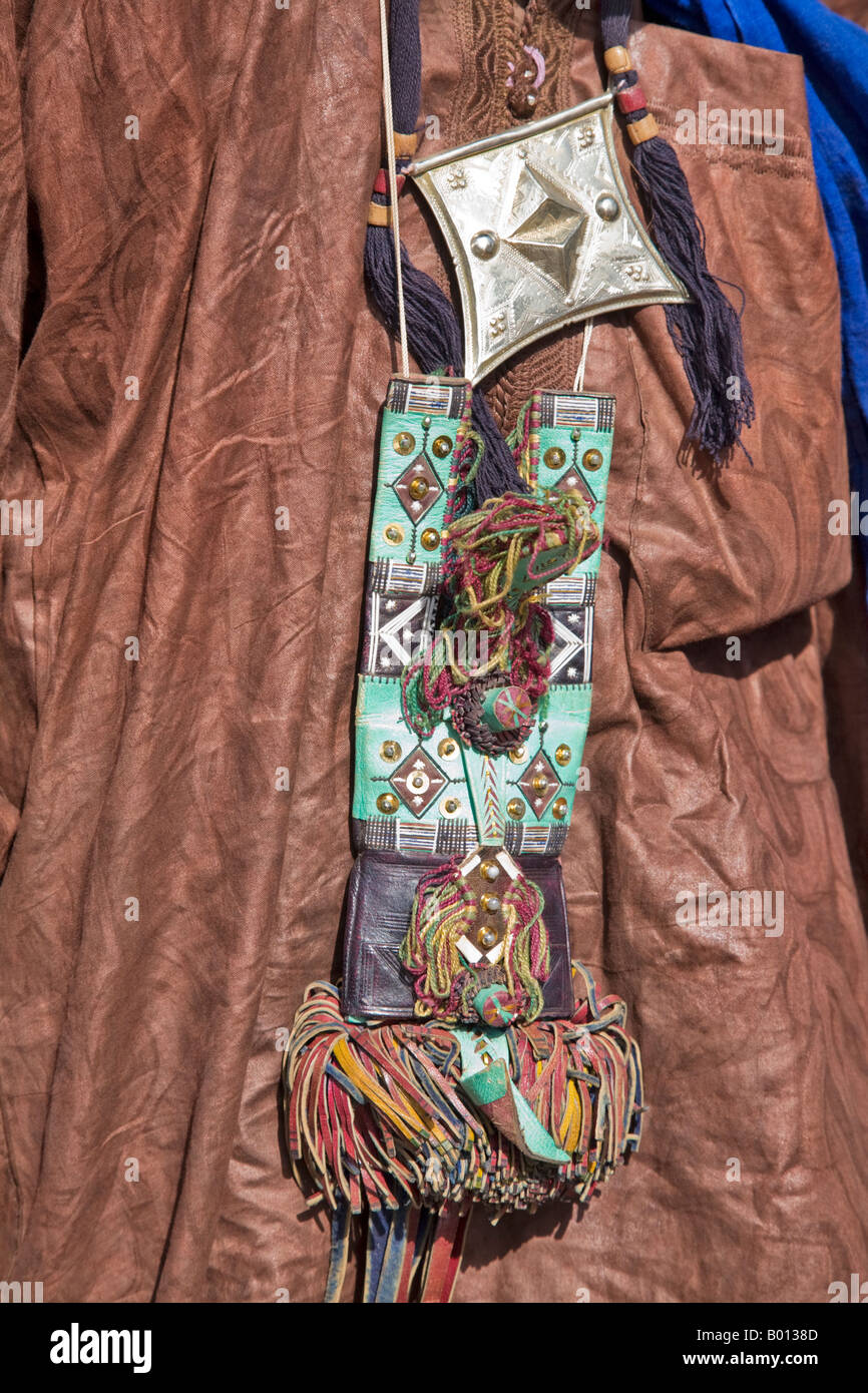 Mali, Timbuktu. An elaborately decorated leather purse and a metal ...