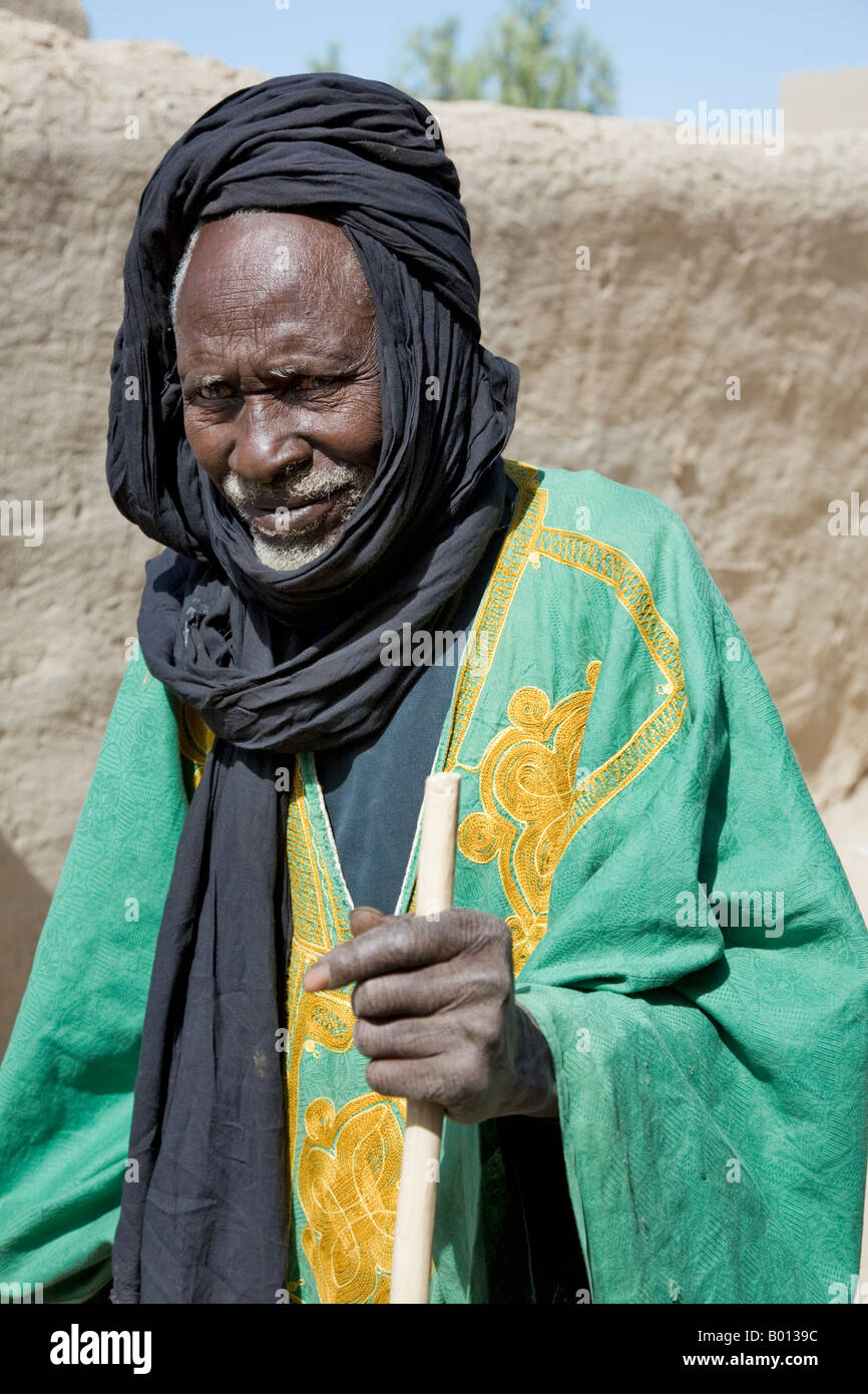 Mali, Niger Inland Delta. An old man in colourful clothes at Kotaka ...
