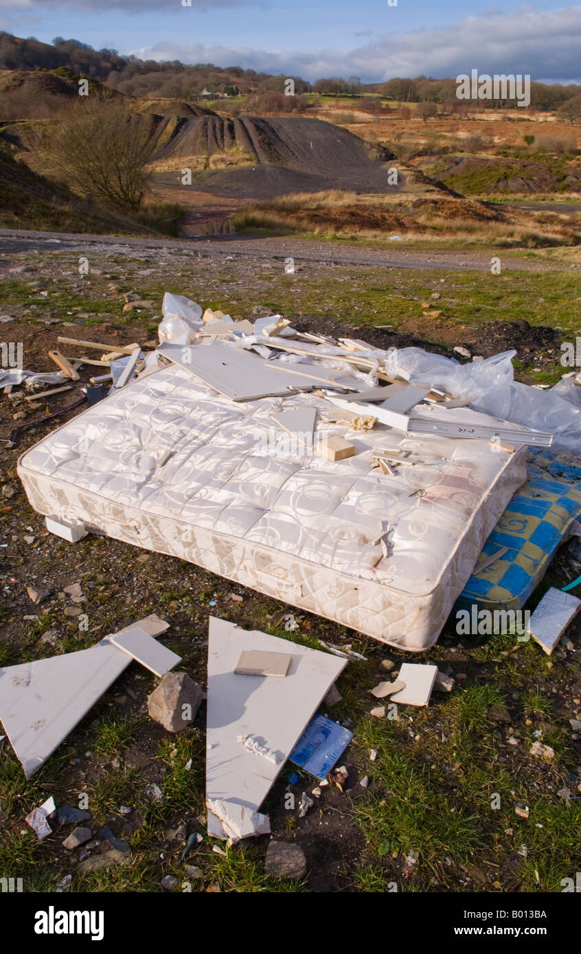 Builders rubble and domestic household waste dumped in countryside in ...