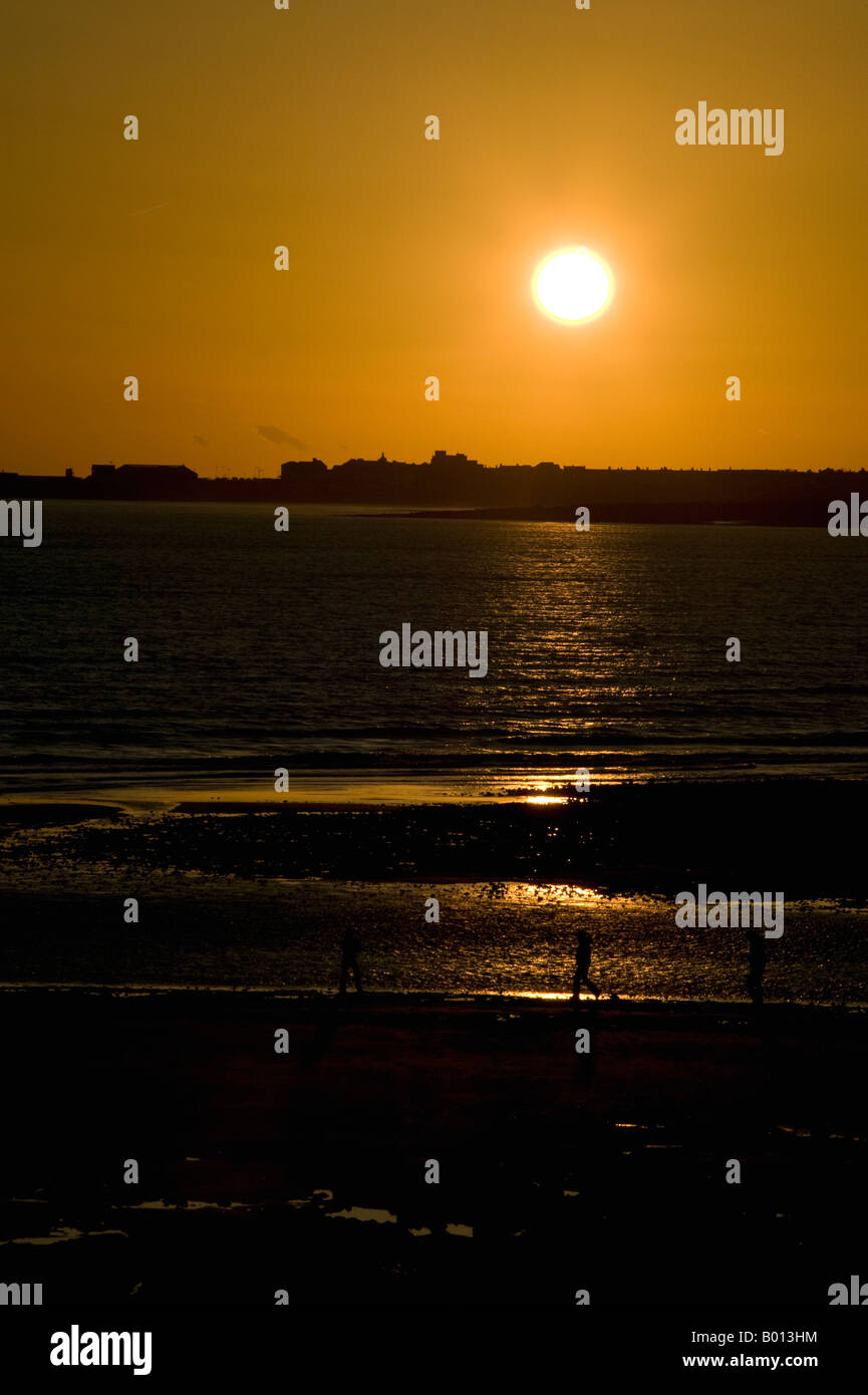 A Walk in The Sunset Stock Photo - Alamy