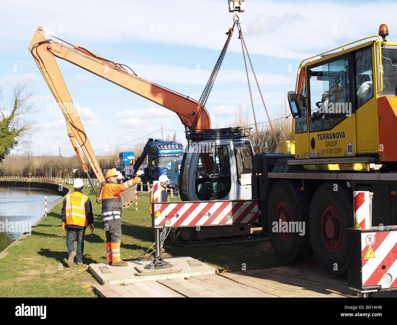 hydraulic stand driver crane jib yellow cabin Stock Photo - Alamy