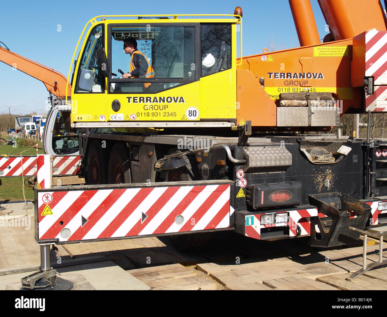 yellow crane cab hydraulic plinth platform raised Stock Photo - Alamy
