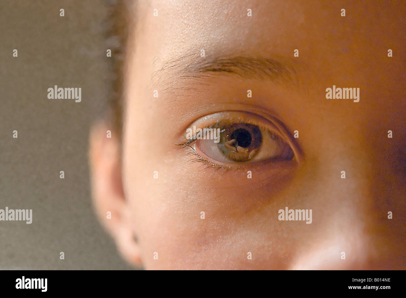 Closeup Child looking into camera Stock Photo - Alamy