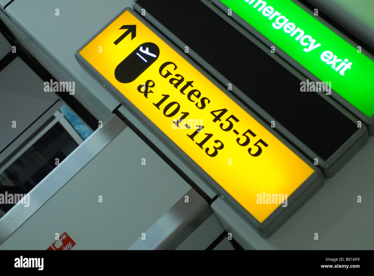 Directional sign in airport Stock Photo - Alamy