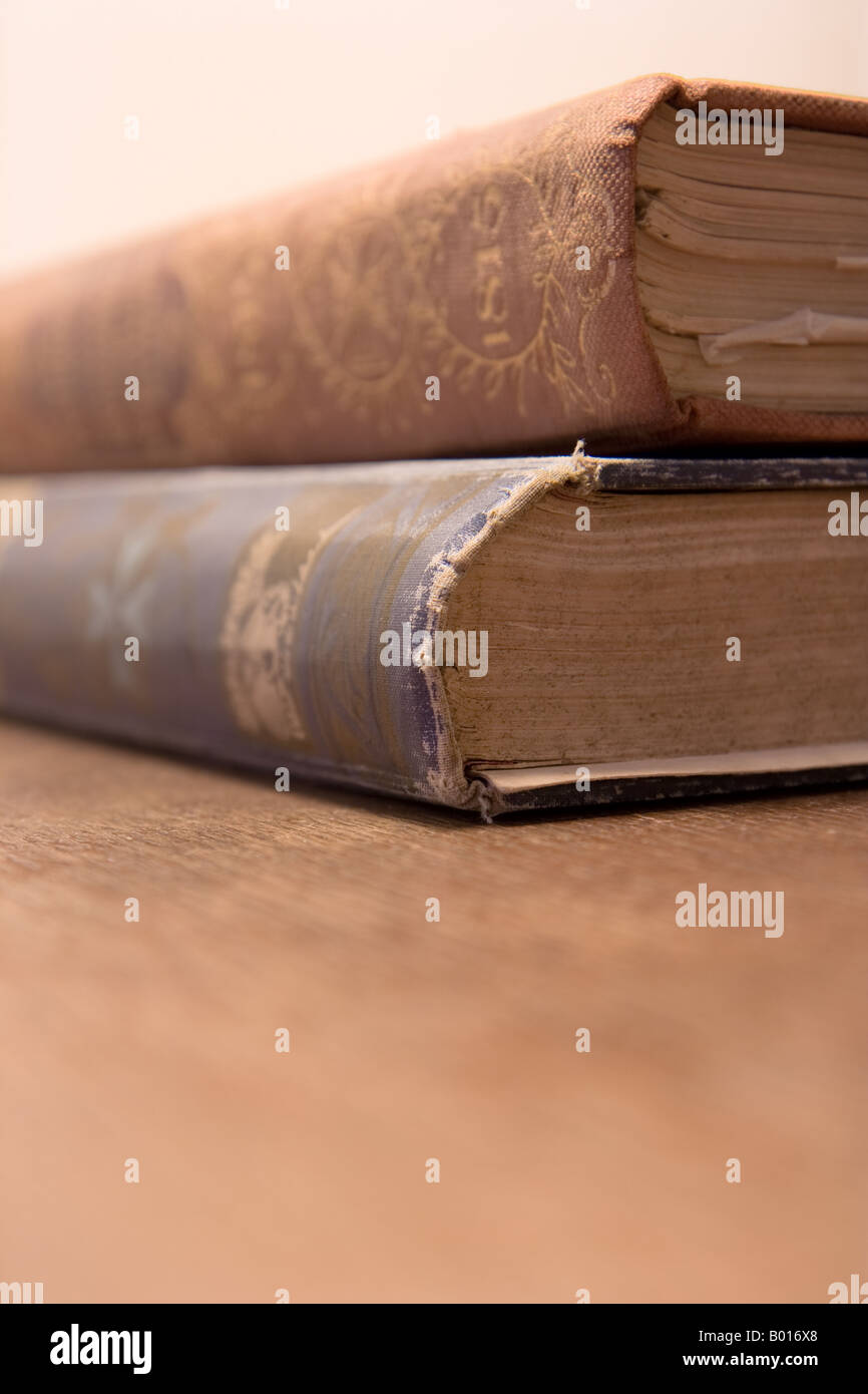 Close-up old book covers on table Stock Photo - Alamy
