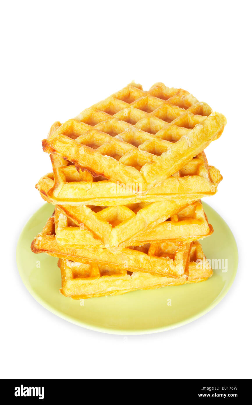 A big stack of waffles on the green plate with soft shadow on white ...