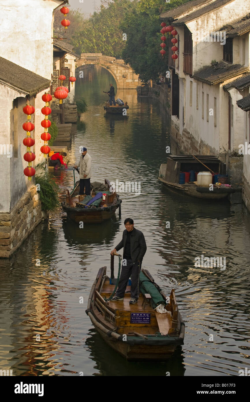 Rowboat on canal of historic water town, Zhouzhuang, Jiangsu Province ...