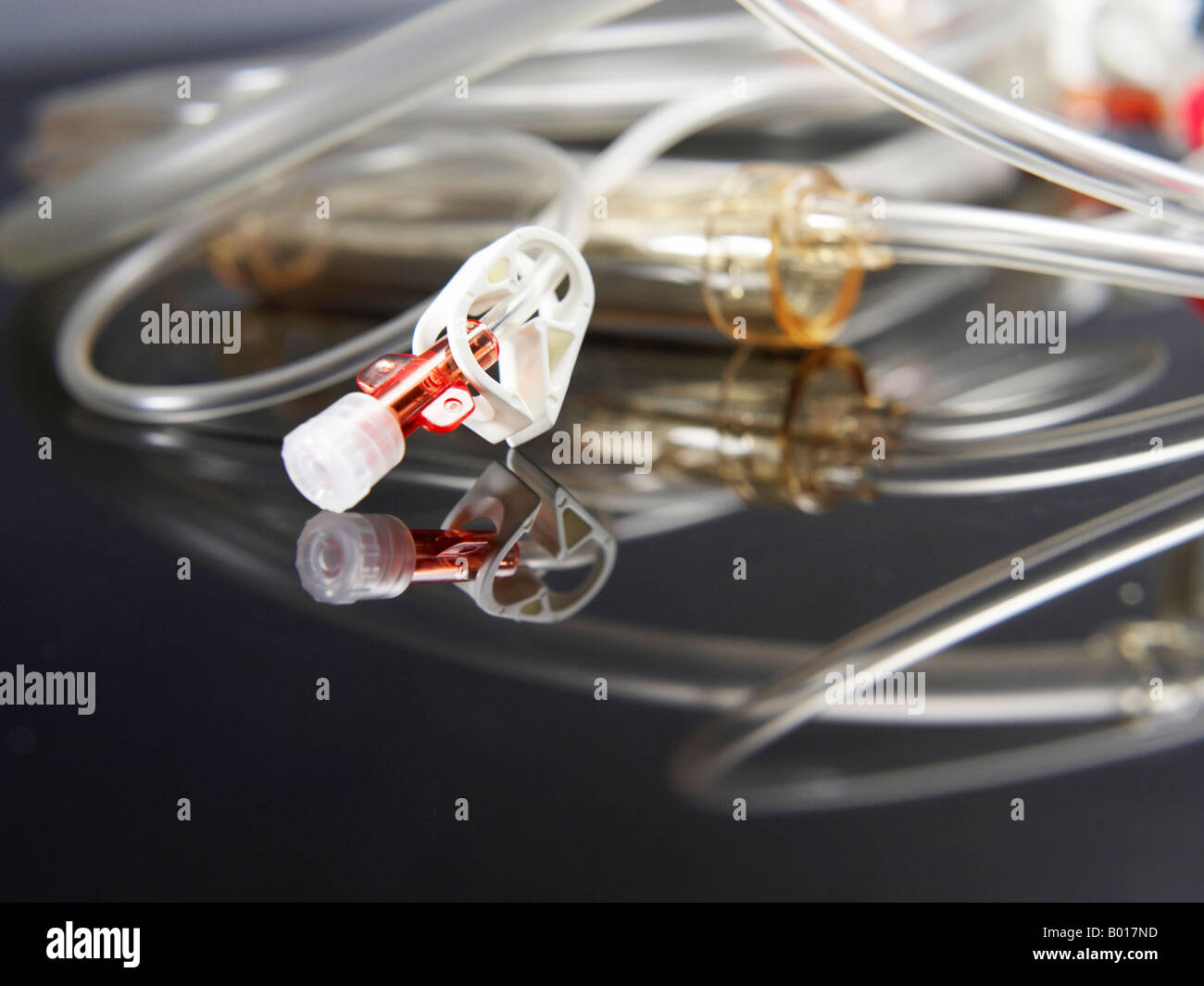 Intravenous tubes with valve Stock Photo - Alamy