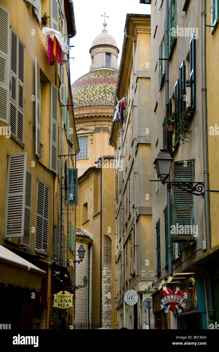 Cathedrale Sainte Reparate de Nice seen through old buildings in Nice ...