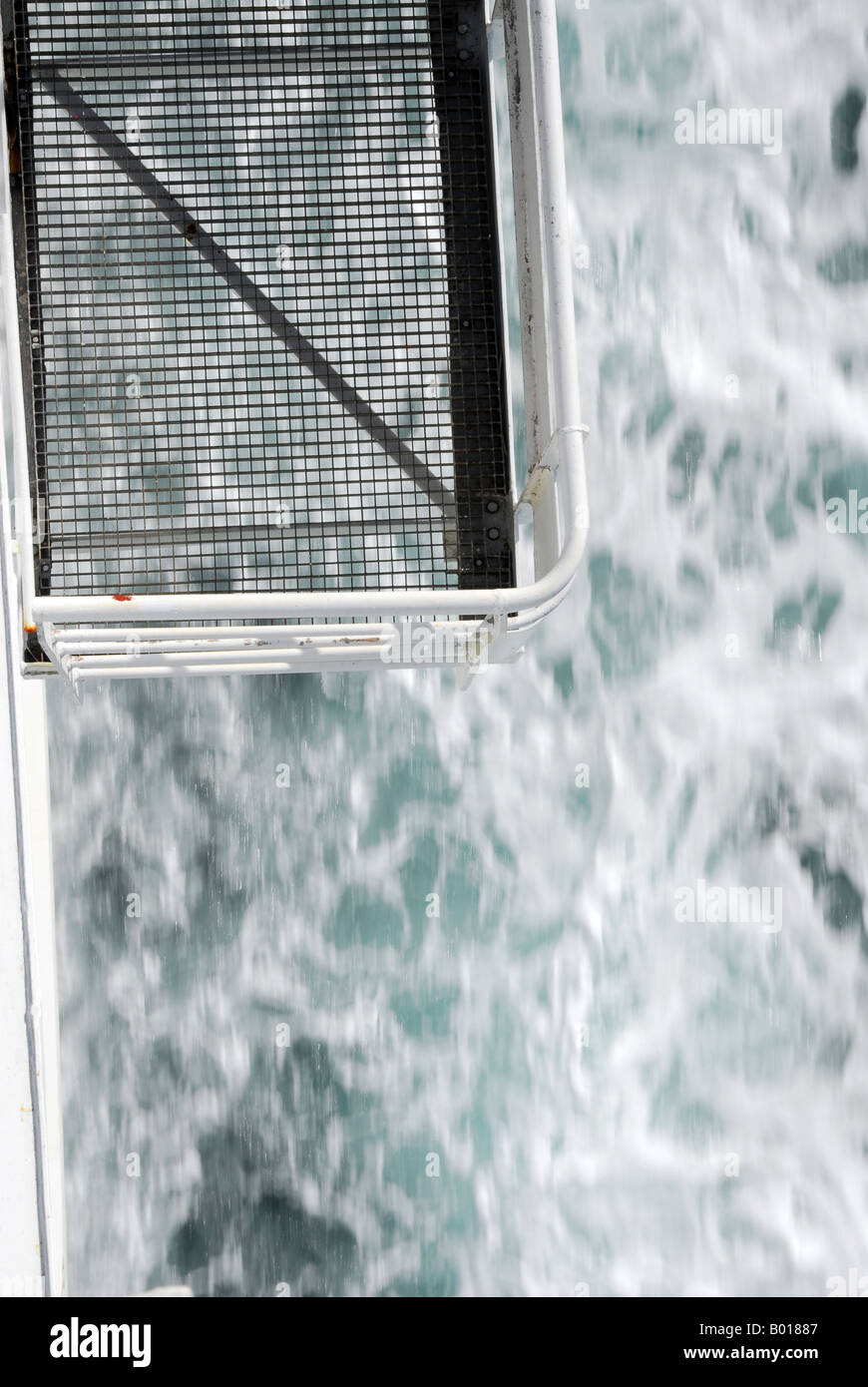wire mesh walkway on the outside of a ship, over the open ocean Stock ...