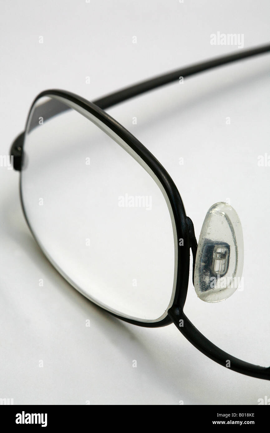 One lens of a pair of glasses Stock Photo - Alamy