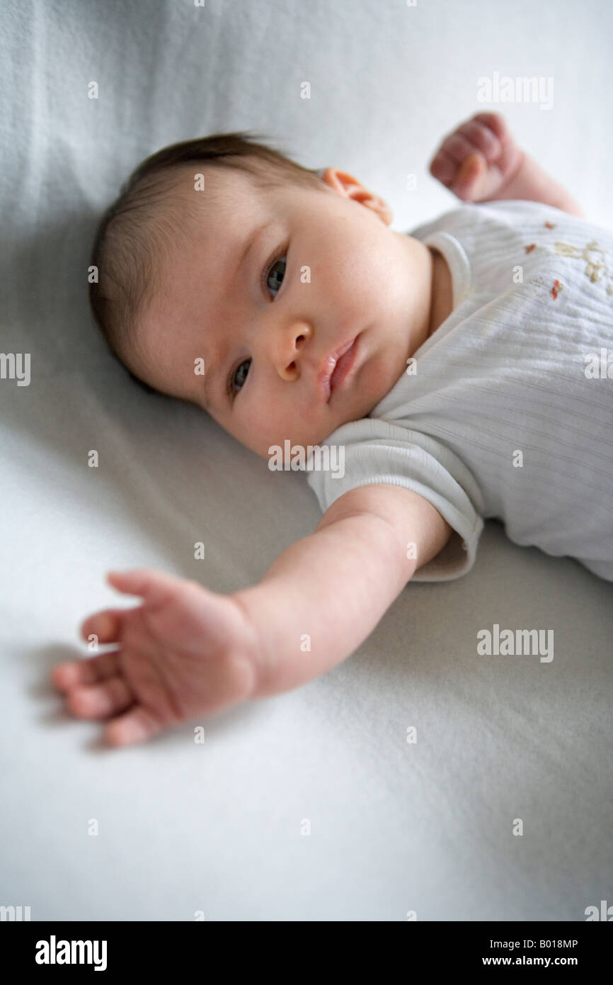 Baby reaching out her hand Stock Photo - Alamy