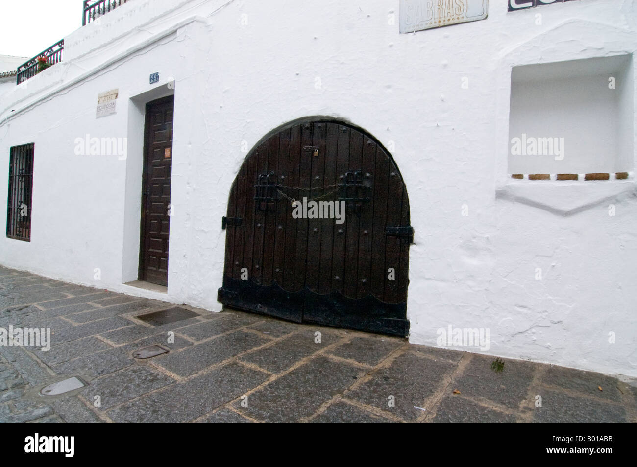 White wall and black gate,Mijas Pueblo;Andalusian White Village,Spain ...