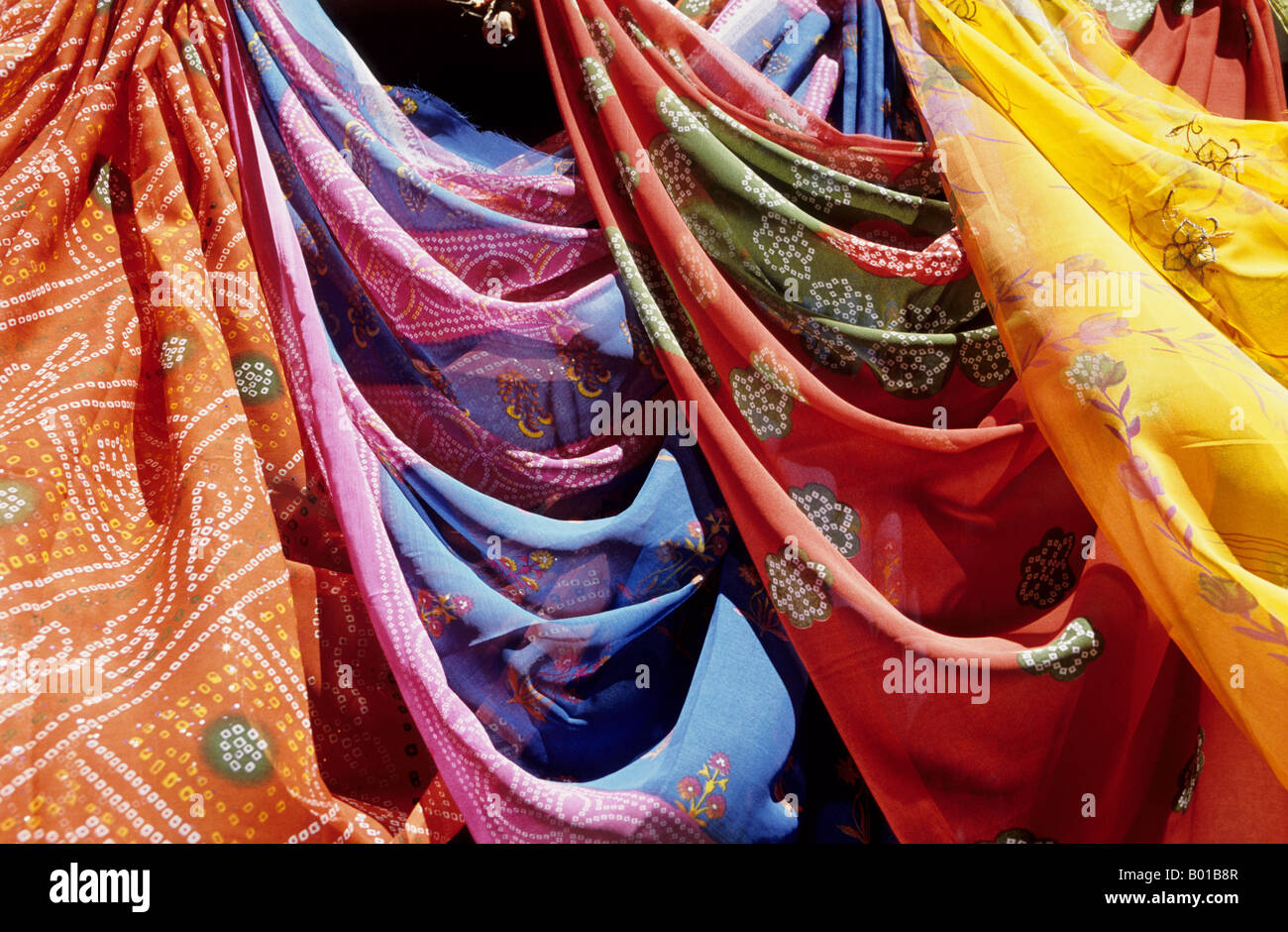 Colourful Indian fabrics on sale in Udaipur, Rajasthan, India Stock ...