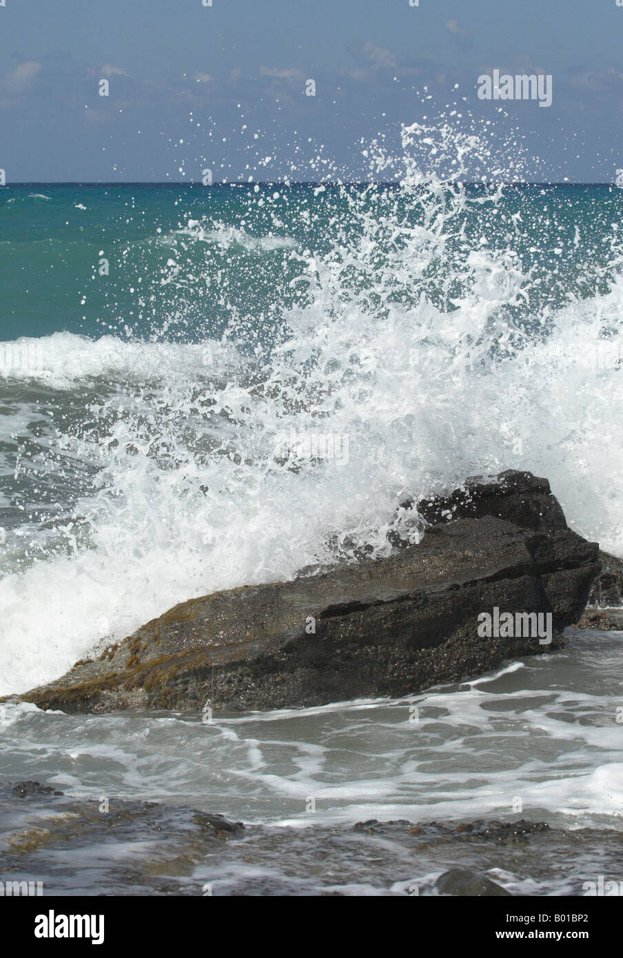 Waves crashing over rocks at the beach at Argaka, north of Polis ...