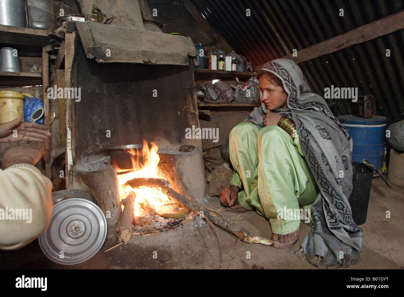 Earthquake victim in an emergency shelter, Bani Muri, Pakistan Stock ...