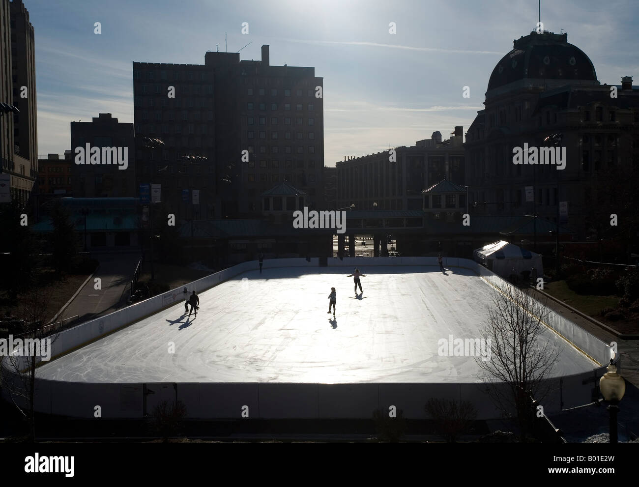 Photograph of ice skaters practicing early one morning Stock Photo - Alamy