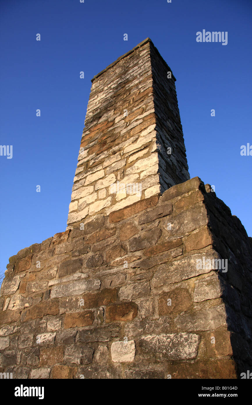 Standing Stone Chimney Against Blue Sky Stock Photo - Alamy