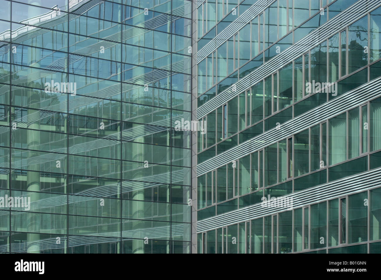 Glass facade of a modern office building Stock Photo - Alamy