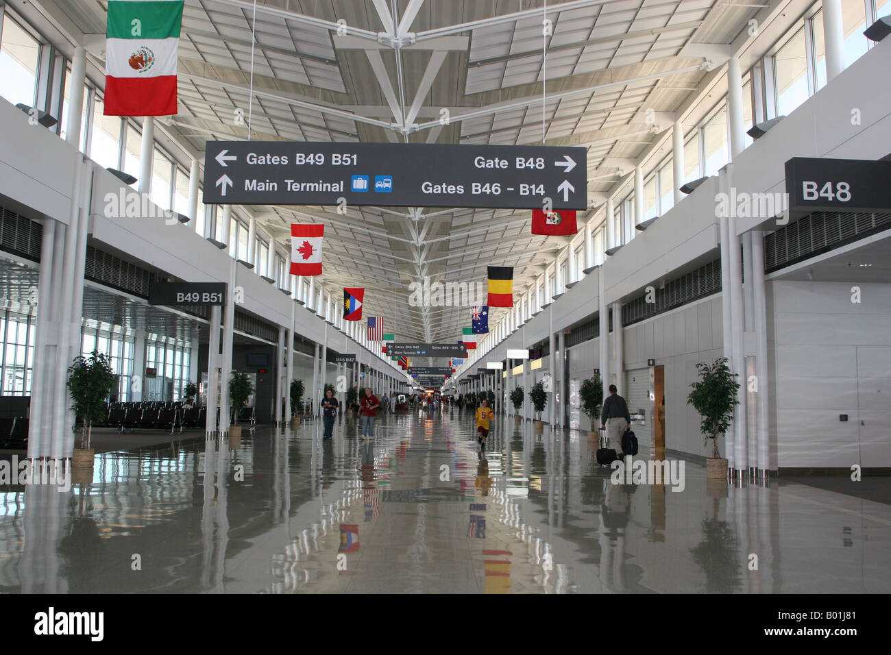 International flags hanging in Concourse B Dulles International Airport ...