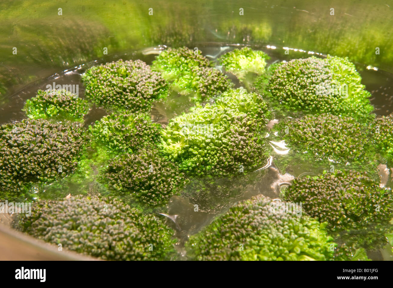 Broccoli in boiling water hi-res stock photography and images - Alamy