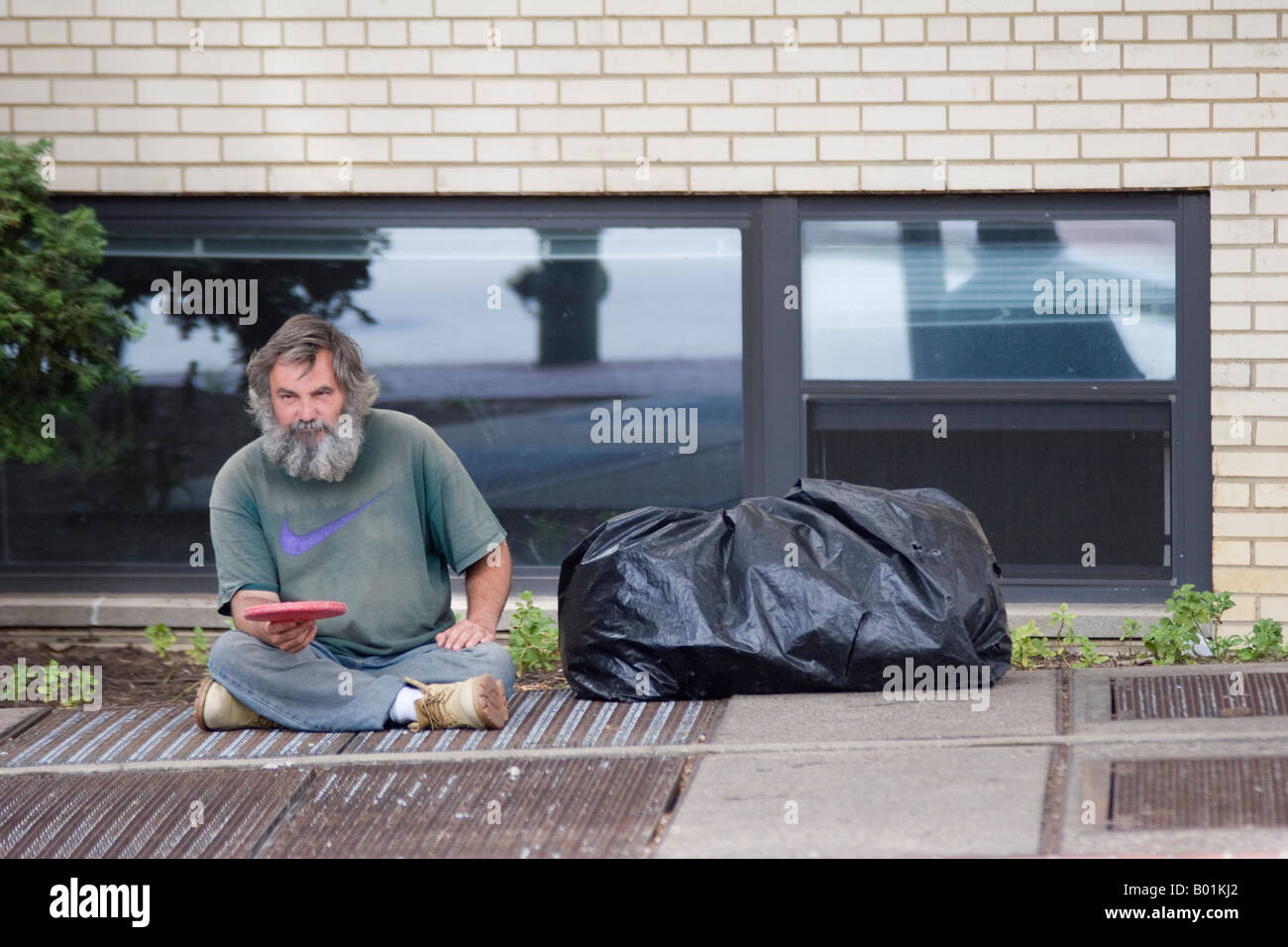A man begs for change in Washington, D.C Stock Photo - Alamy