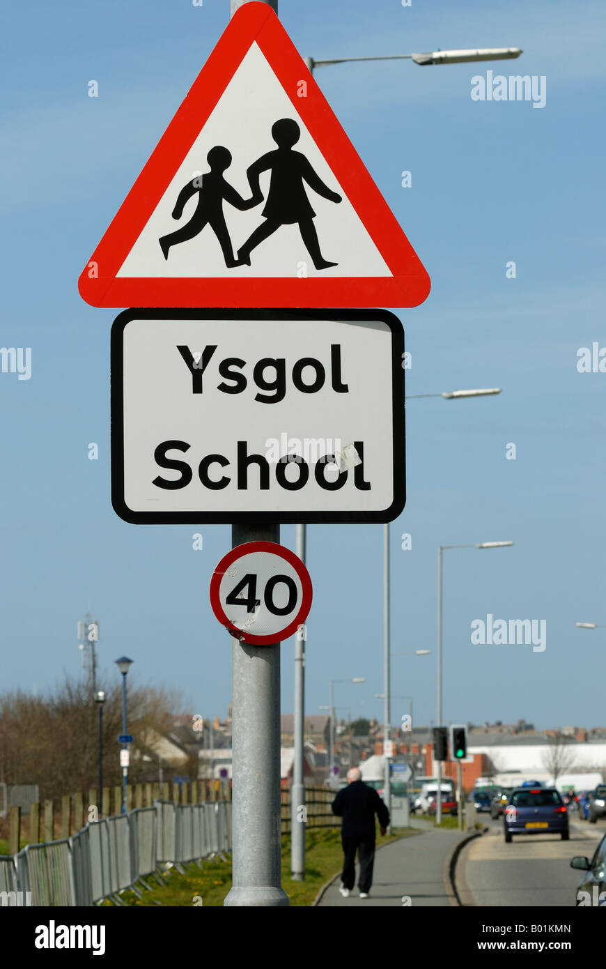 Children crossing warning sign with Tetra mast in background Stock ...
