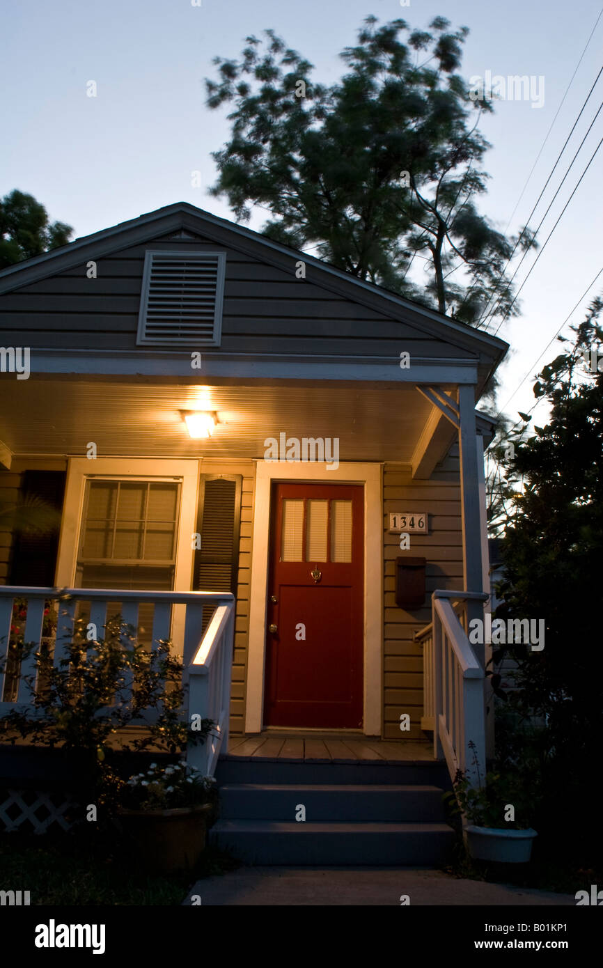 House Exterior with Front Porch Light On at Dusk Stock Photo - Alamy