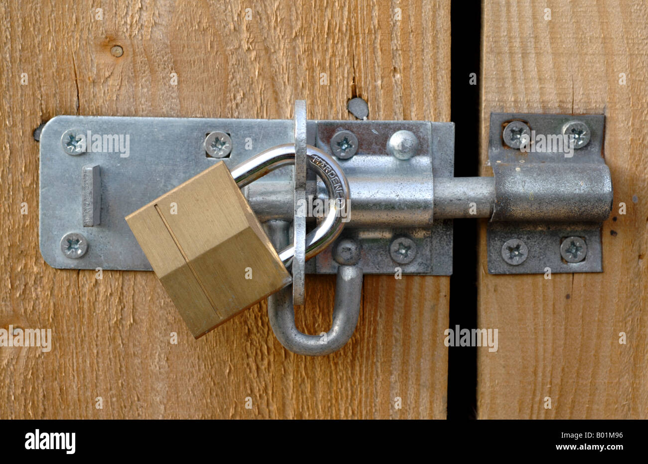 Padlock, bolted door Stock Photo - Alamy