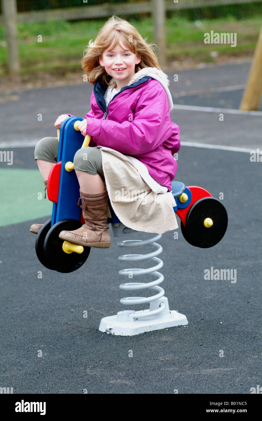 Childrens Playground with Soft Play Safety Surface Little Girl Playing ...