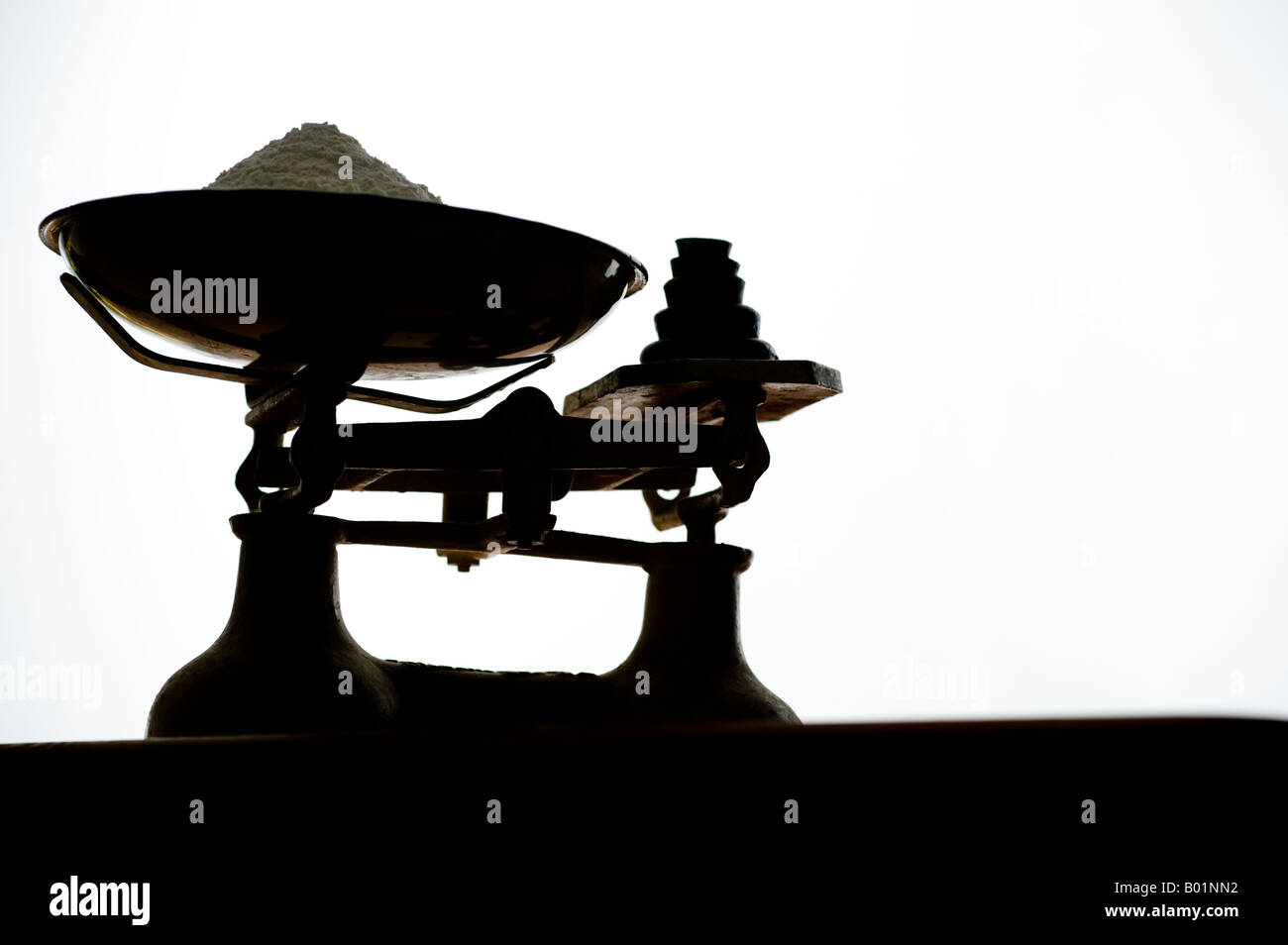 Old fashioned traditional weighing scales hi-res stock photography and ...