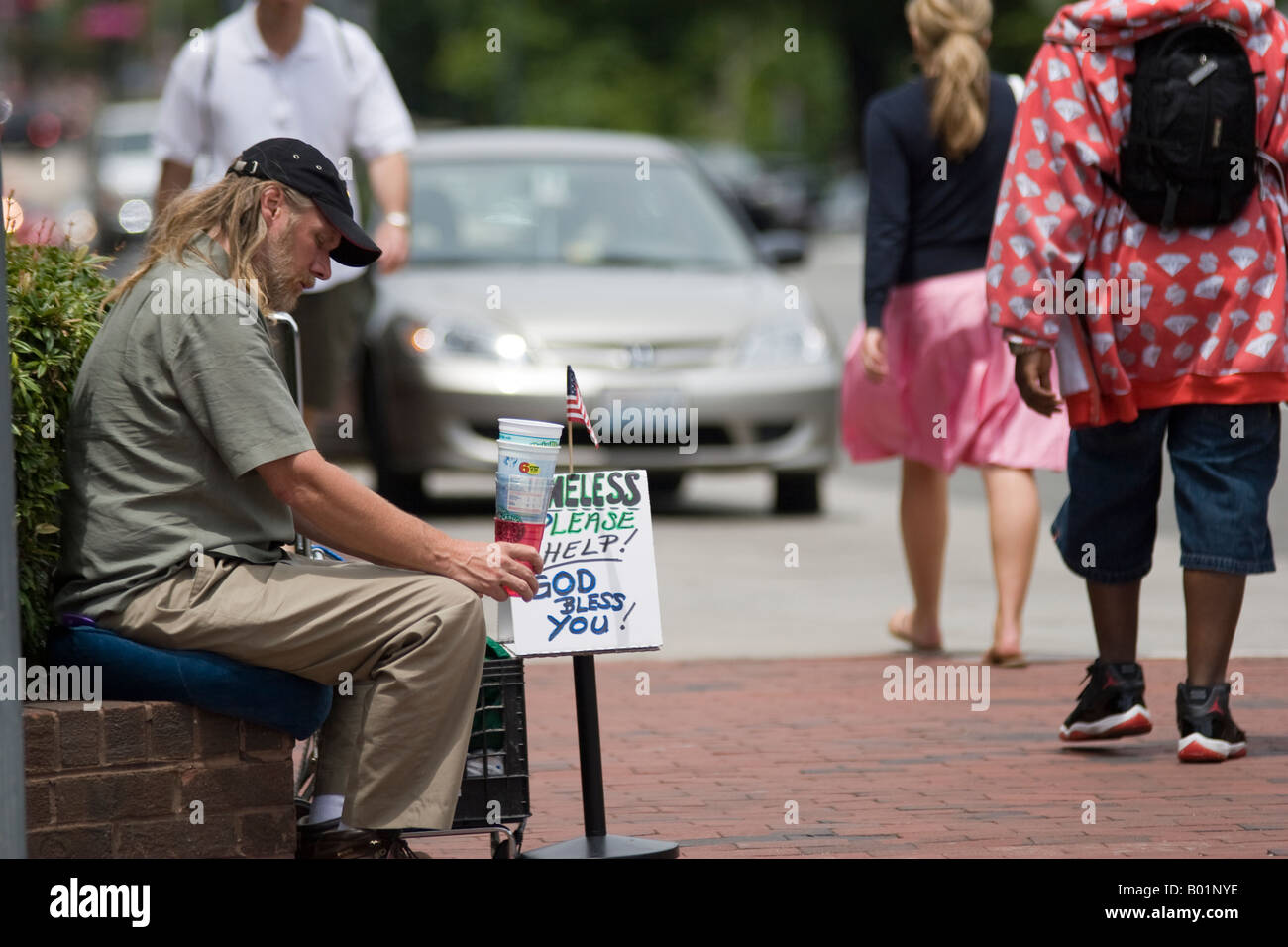 A homeless man begs for change in Washington, D.C., USA Stock Photo - Alamy