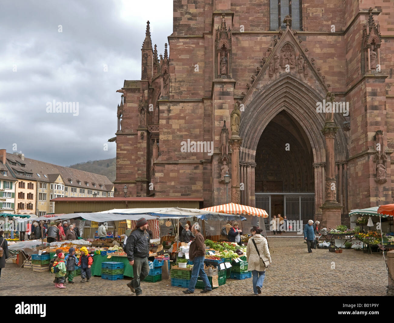 marketplace Münsterplatz with market stalls in front of western ...
