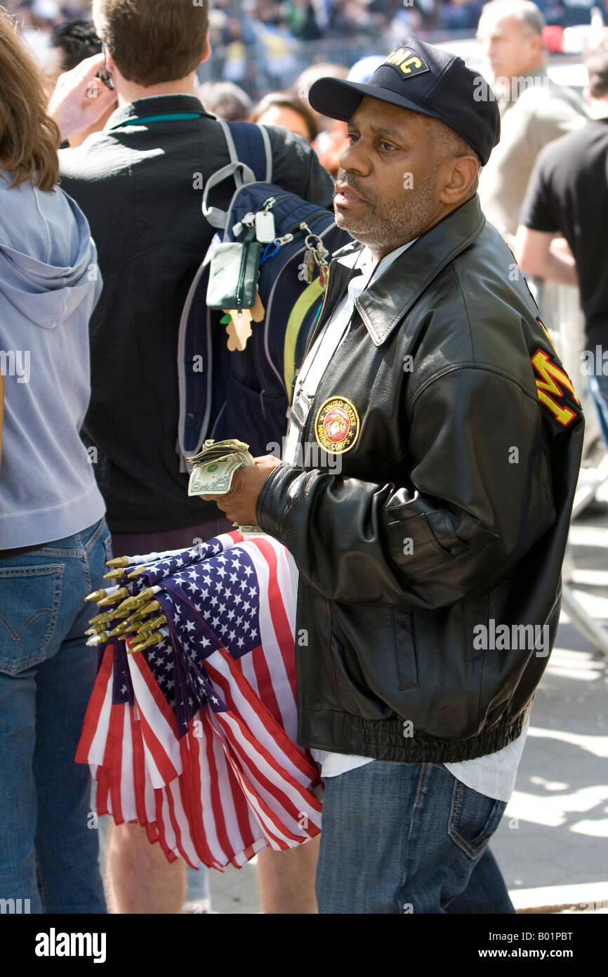A man sells U.S. flags during the 2008 visit to NY by Pope Benedict ...