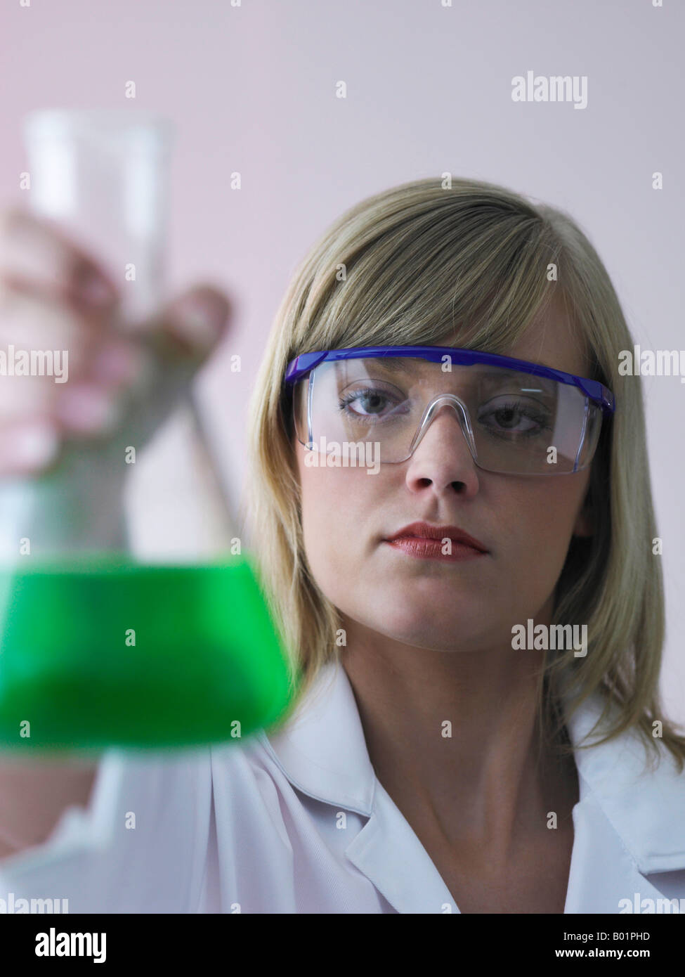 Female hand holding canister hi-res stock photography and images - Alamy