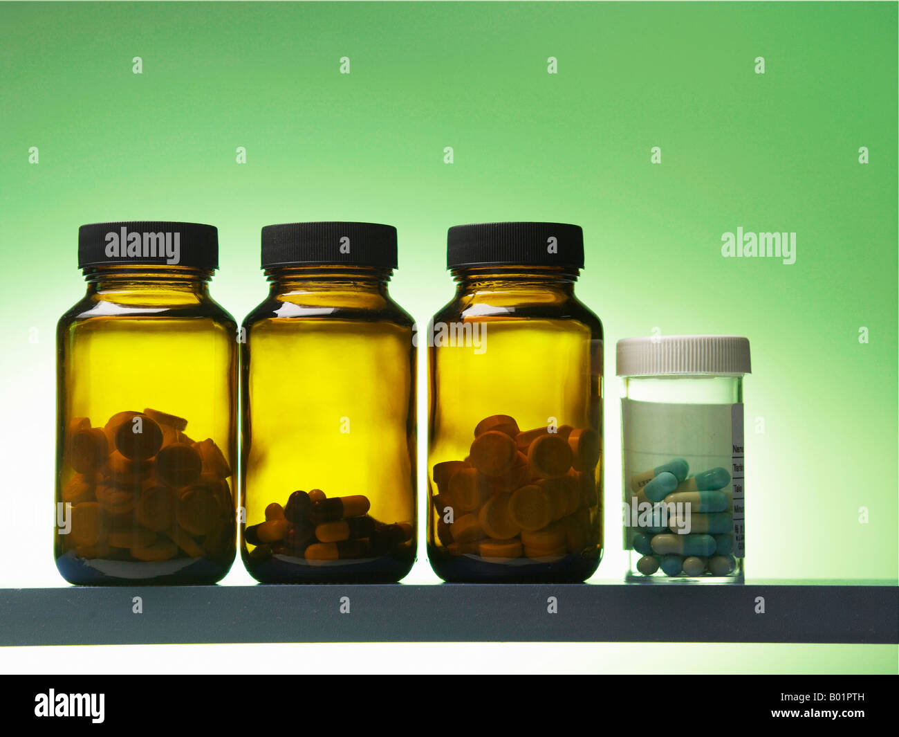 Row of medicine bottles Stock Photo - Alamy