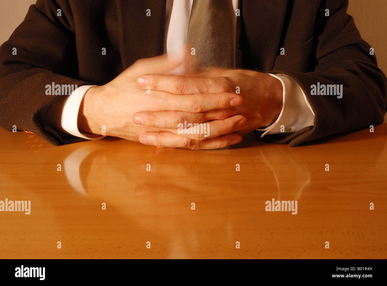 Hand gestures: thumbs circling Stock Photo - Alamy