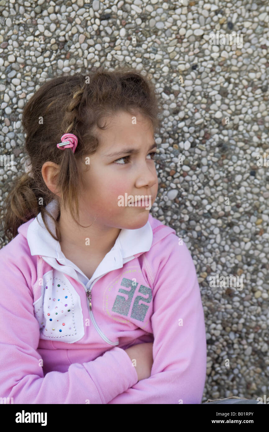 Young girl getting nervous from the long waiting Stock Photo - Alamy