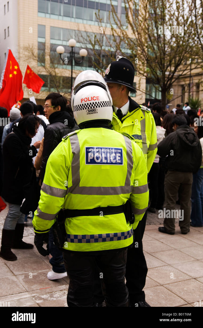 Policeman wearing helmet Manchester UK Stock Photo - Alamy