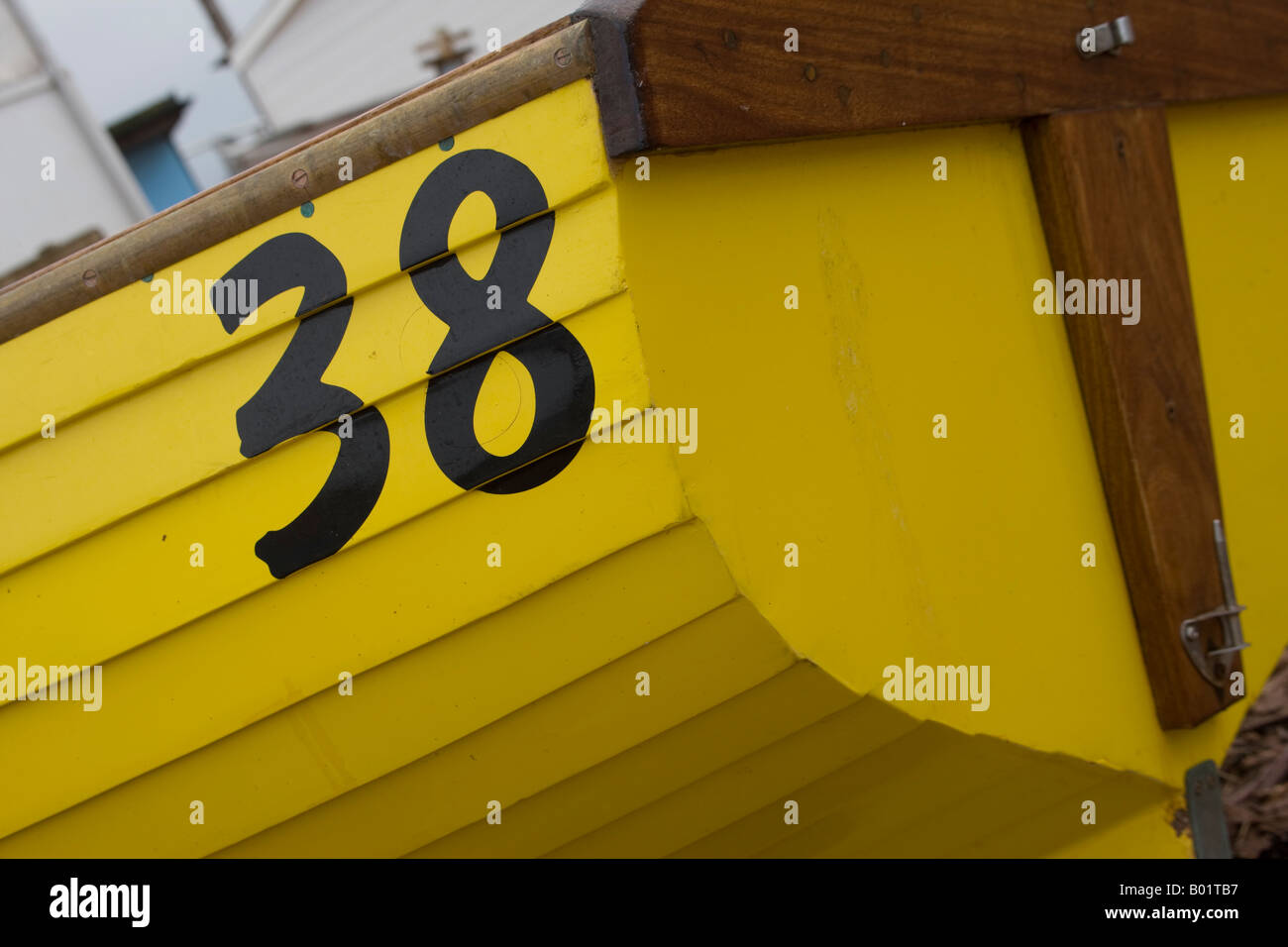 Yellow boat number 38 Stock Photo - Alamy