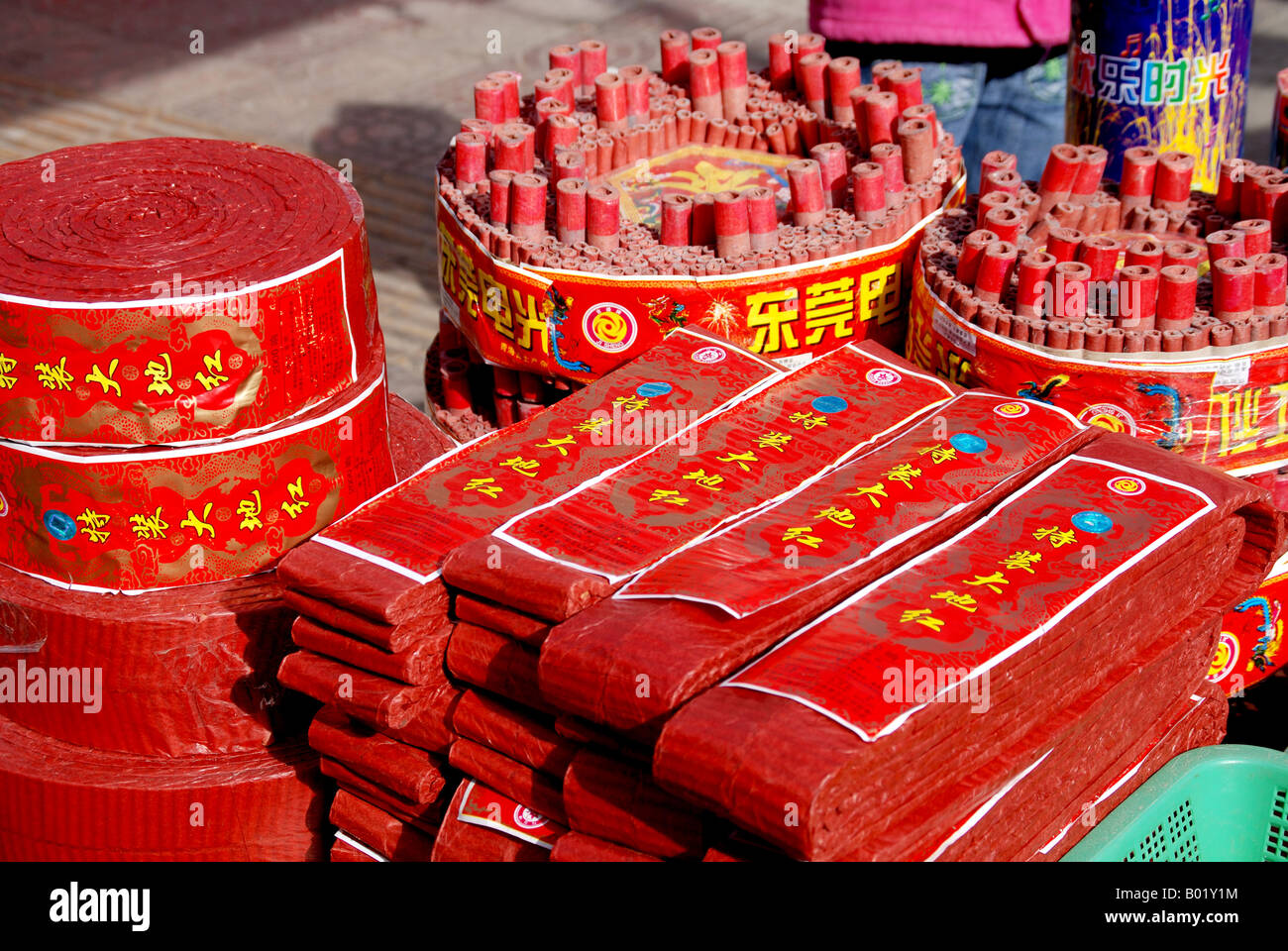 A small explosive charge and a fuse in a heavy paper casing, exploded ...