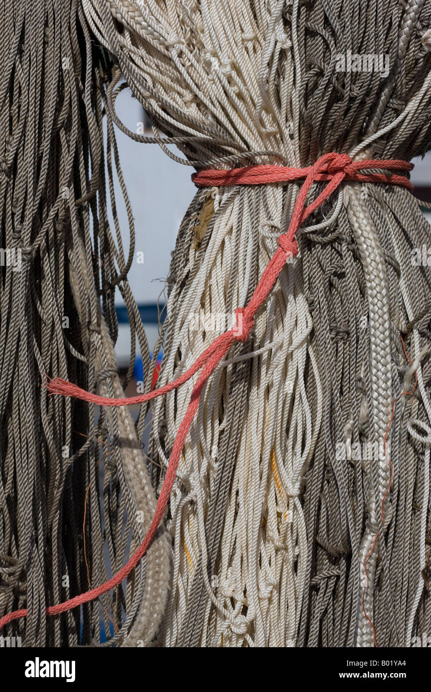 fishing net hanging to dry Stock Photo - Alamy
