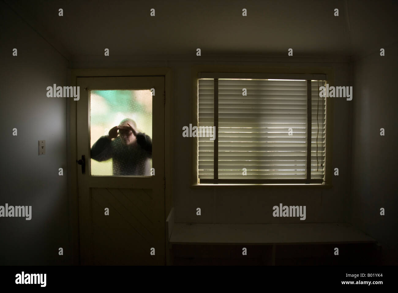 Face pressed against glass hi-res stock photography and images - Alamy