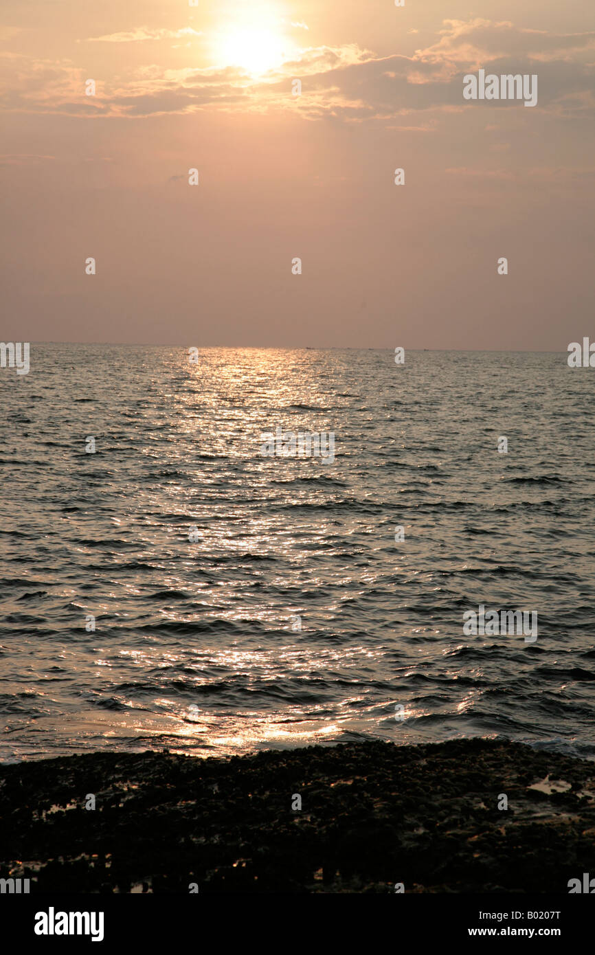 sunset at kovalam beach,kerala,india Stock Photo - Alamy