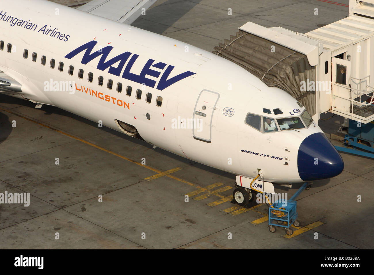 Malev Hungarian Airlines Boeing 737 parked at airport terminal gate ...
