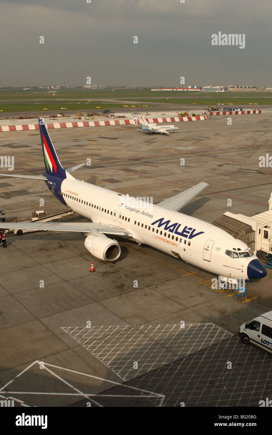 Malev Hungarian Airlines Boeing 737 parked at airport terminal gate ...