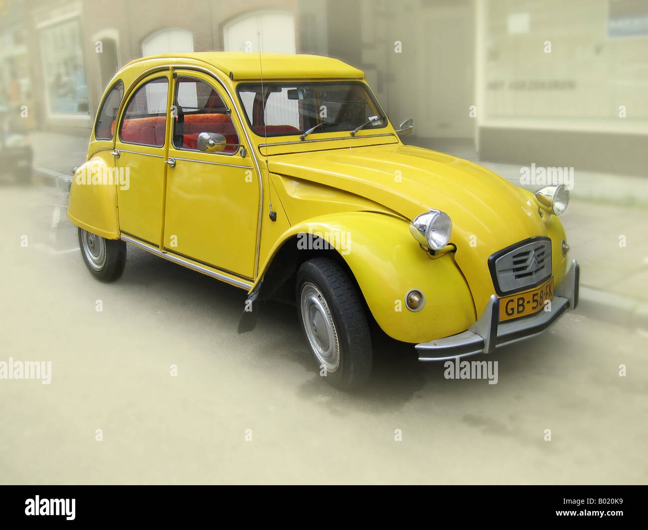 yellow citroen deux chevaux parked by roadside Stock Photo - Alamy