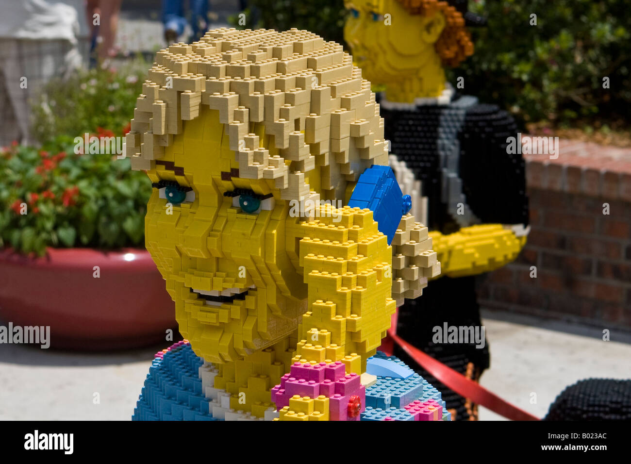 LEGO Life Sized Female Child on Cellular Phone at Downtown Disney ...